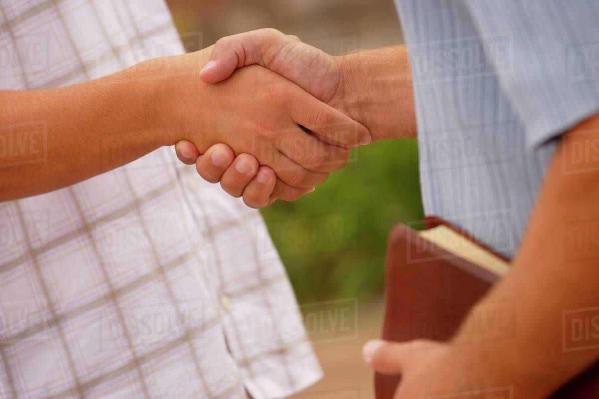 Hand Shake - Stock Photo - Dissolve