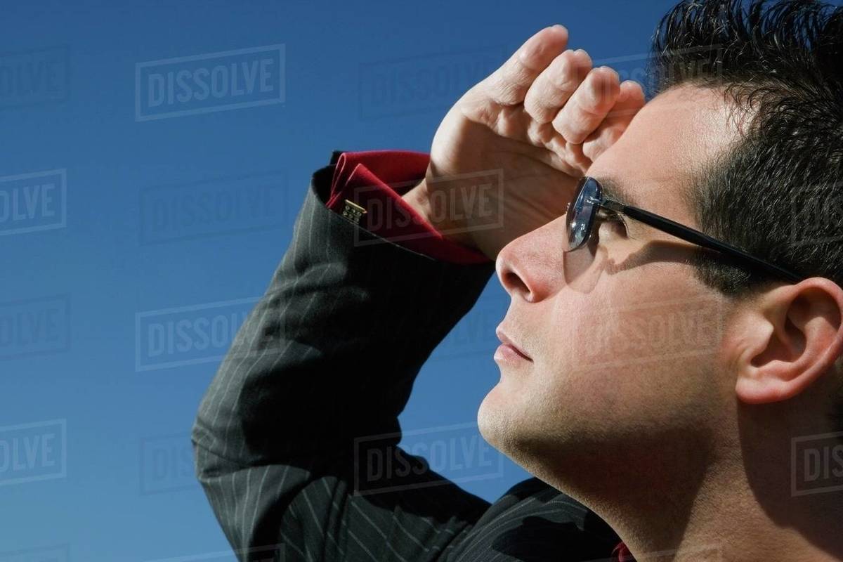 Man Looking Upward - Stock Photo - Dissolve