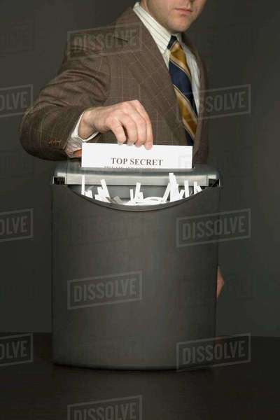 Businessman Shredding Document - Royalty-free Stock Photo | Dissolve