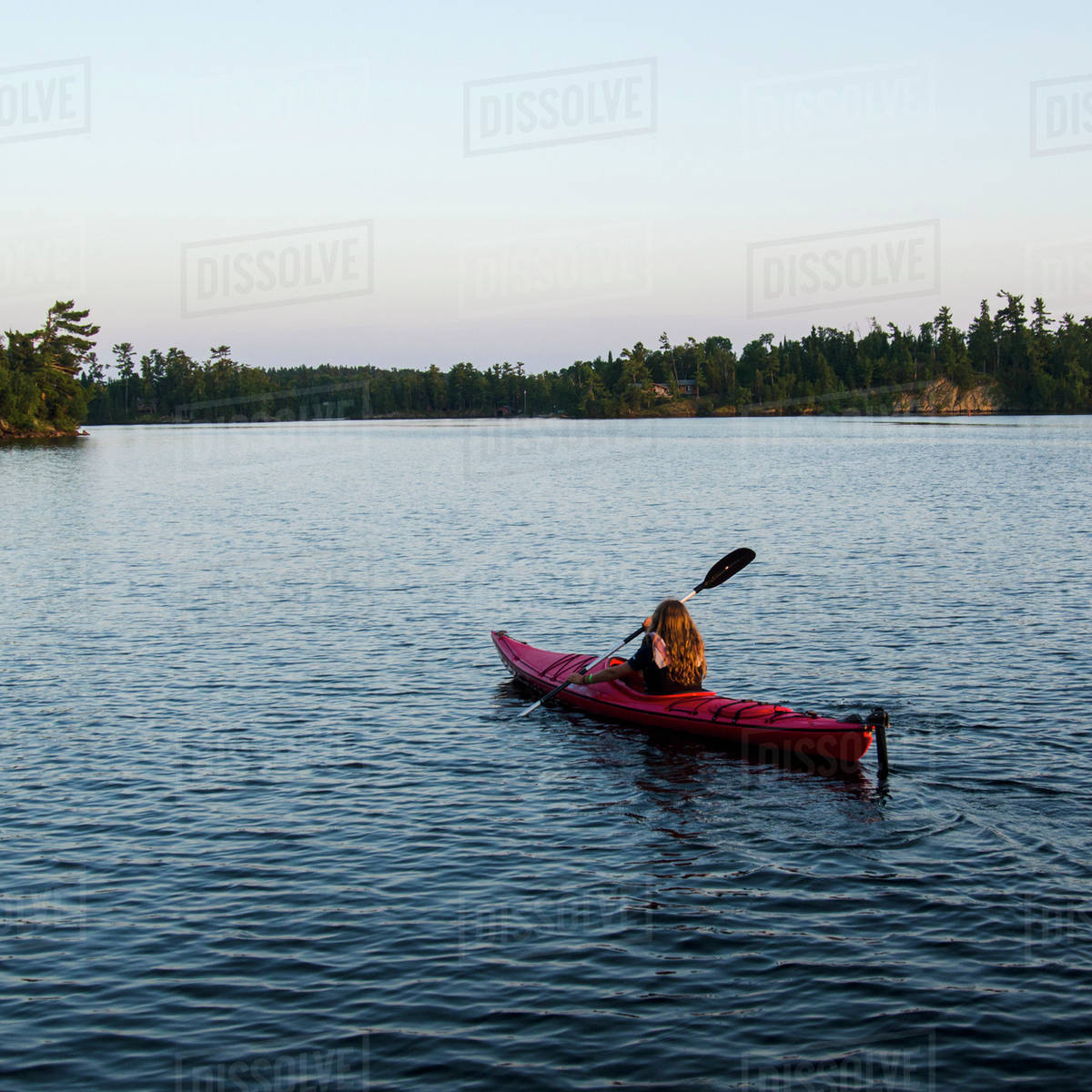 A Girl In A Kayak; Lake Of The Woods, Ontario, Canada - Royalty-free ...