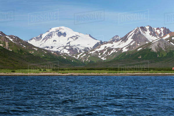 View Of The Mountains Along The Coastline; False Pass, Alaska, United ...