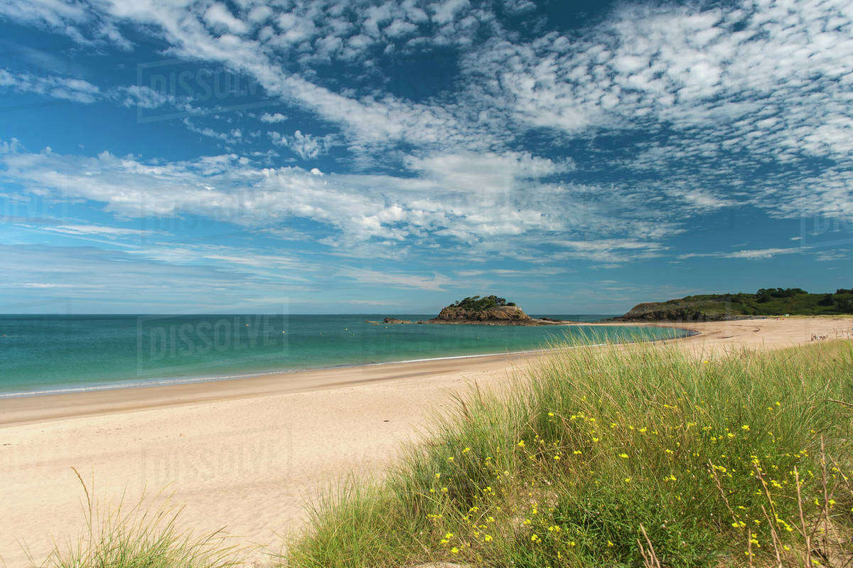 View over dunes and along beach to the fort du guesclin near cancale ...