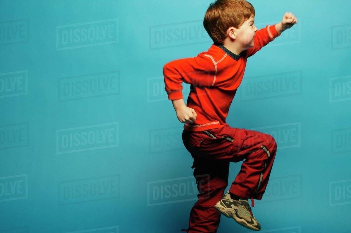 Little Boy Marching - Royalty-free Stock Photo | Dissolve