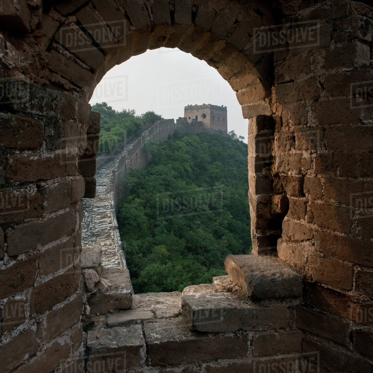 View from an arched brick window to the Great Wall of China;Beijing ...