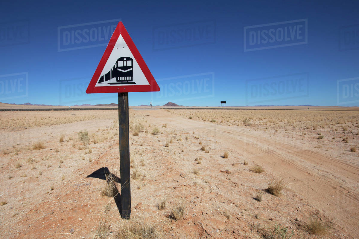 Railway traffic sign beside a desert road;Garub namibia - Royalty-free ...