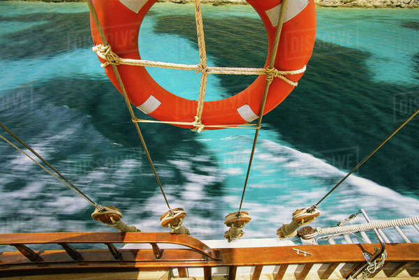 Water rushing past a moving boat; Europe - Stock Photo - Dissolve