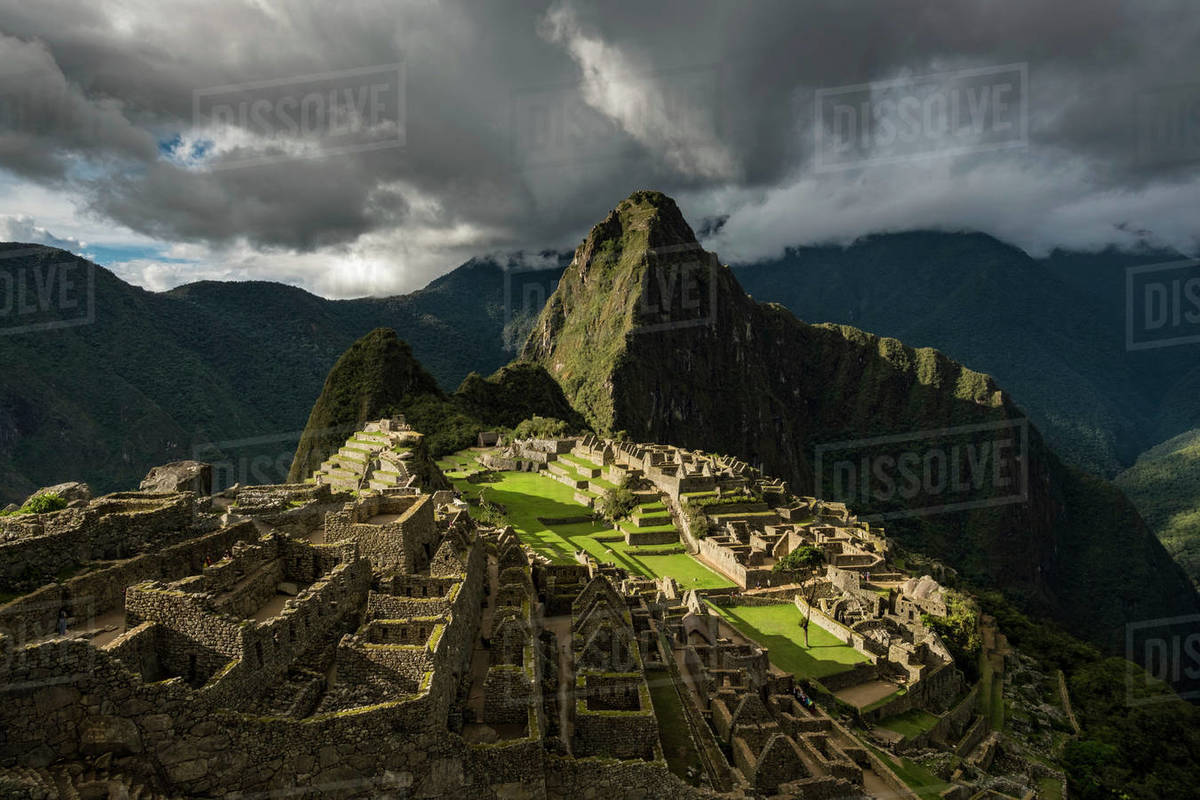 Inca ruins of Machu Picchu with reconstructed stone buildings; Peru ...