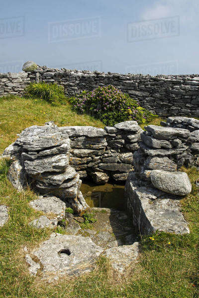 Holy well of St. Enda on Inisheer island off the Galway coast; County ...
