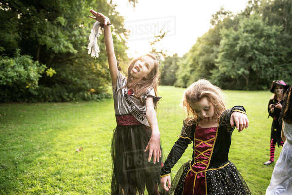 Two children dressed in costume for Halloween Night. - Royalty-free ...