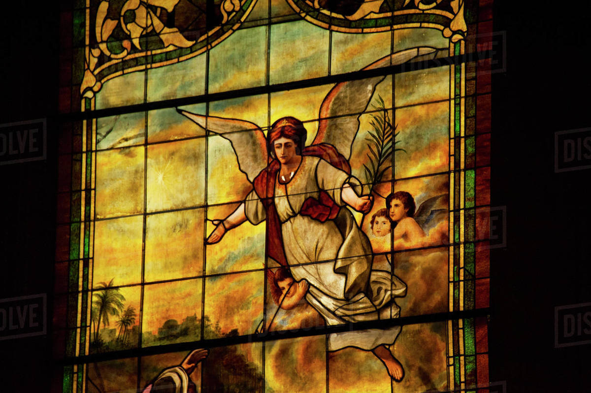 Stained glass window in a church depicting an angel; Lincoln, Nebraska ...