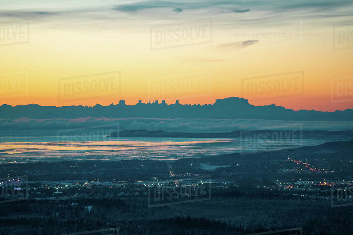 The winter inversion, or fata morgana, accentuates the peaks as the sun ...