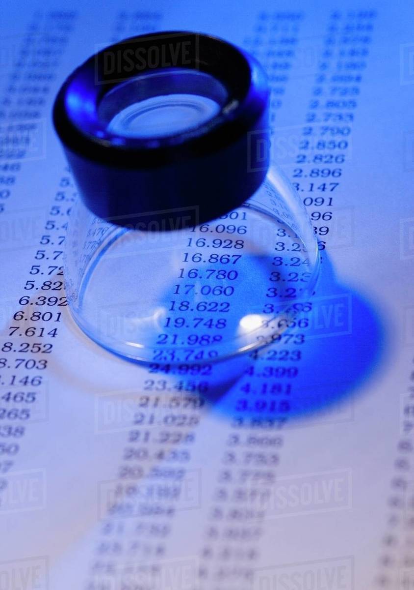 Taking A Closer Look At The Numbers - Royalty-free Stock Photo | Dissolve