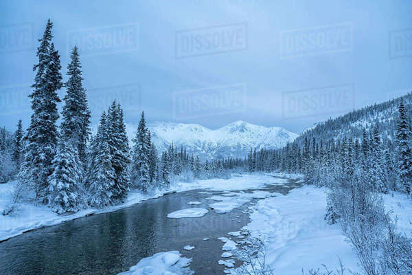 Overview of the Wheaton River at sunrise with the mountains in the ...
