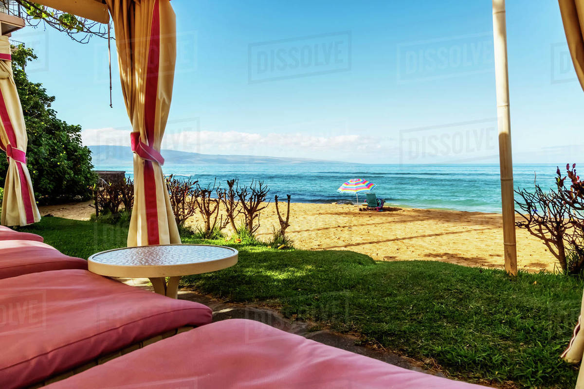 A beach enclosure at the water's edge on Ka'anapali Beach, with an ...