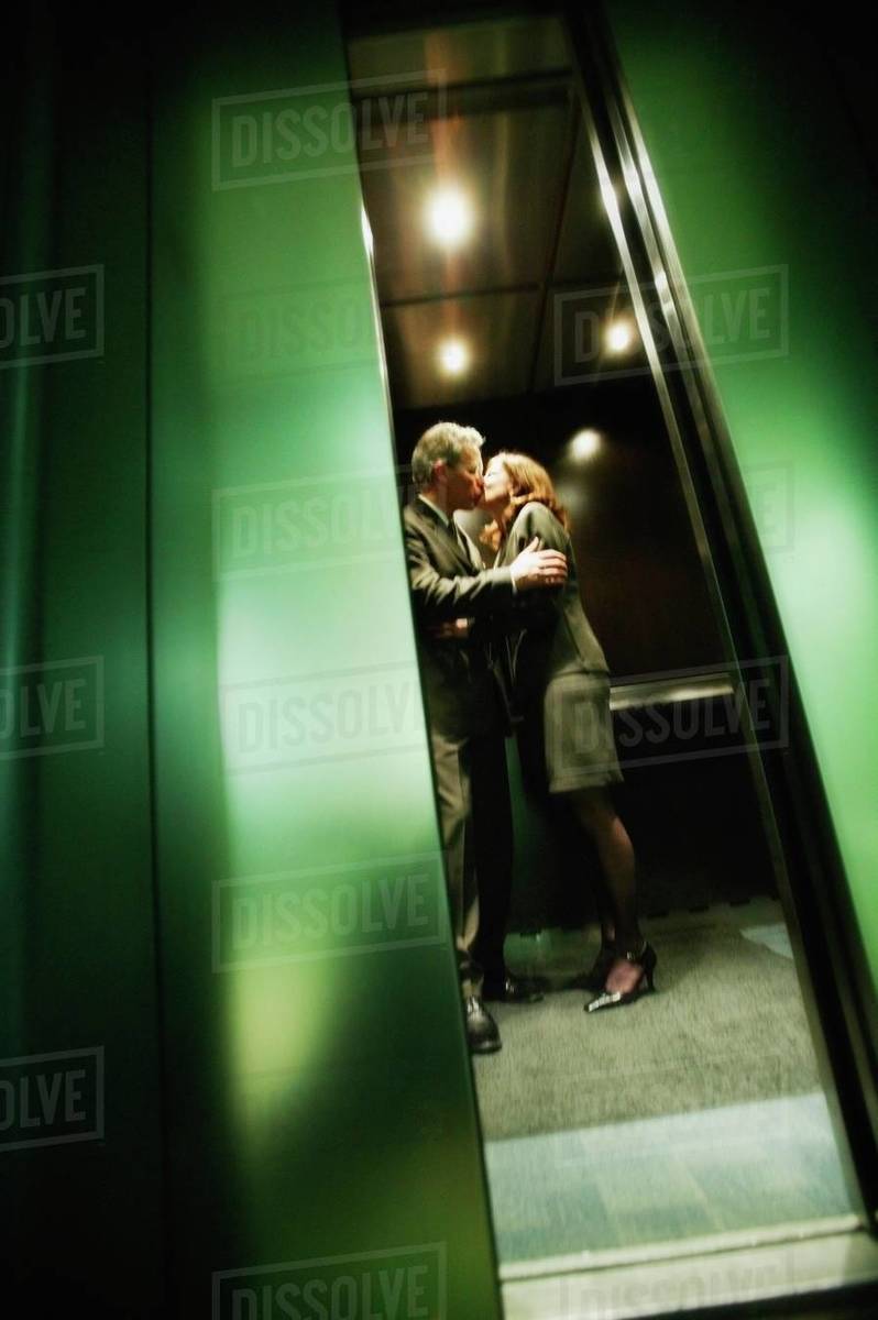 Couple Kissing In Elevator - Royalty-free Stock Photo | Dissolve