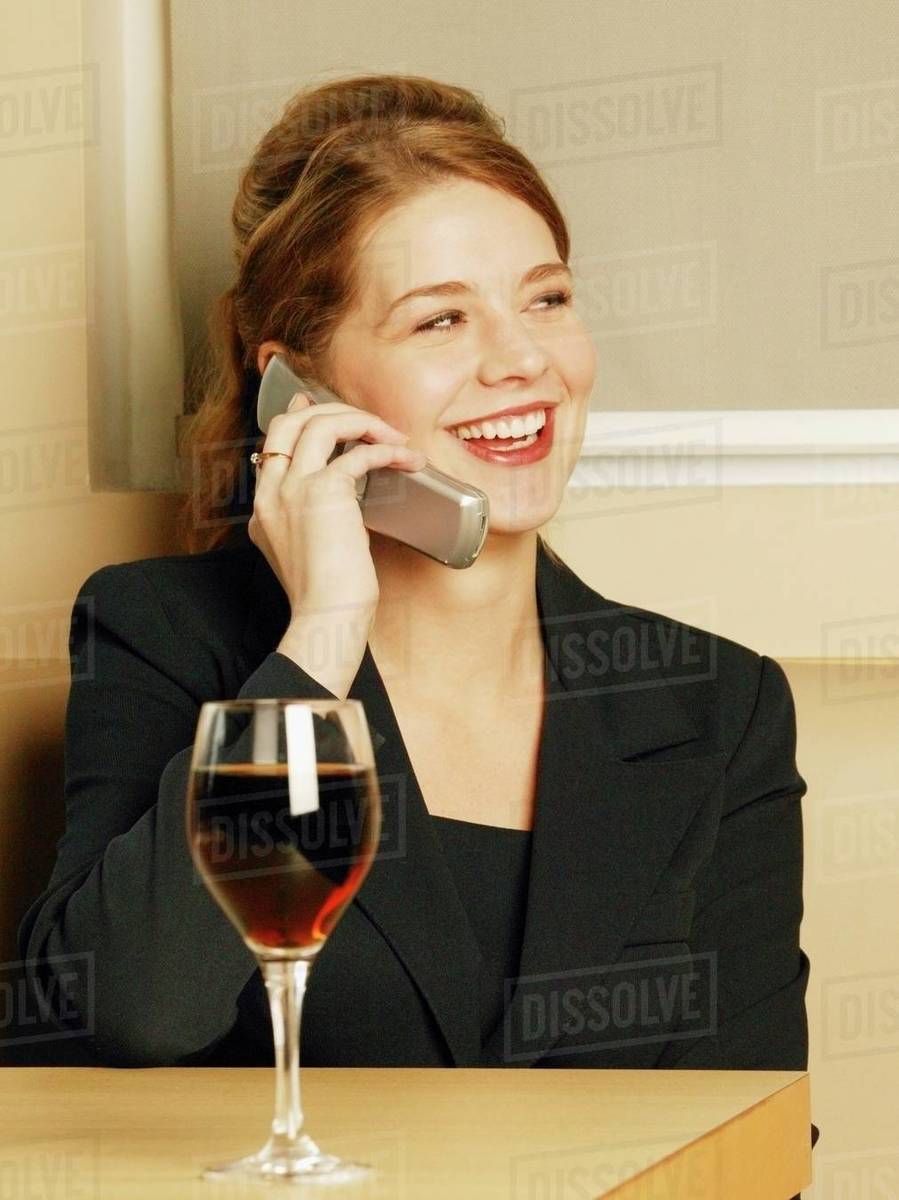 Professional Woman On Cell Phone - Royalty-free Stock Photo | Dissolve