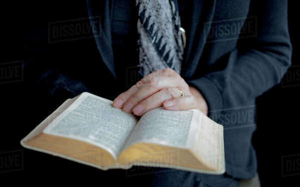 Woman's hands holding an open Bible; Studio - Royalty-free Stock Photo ...