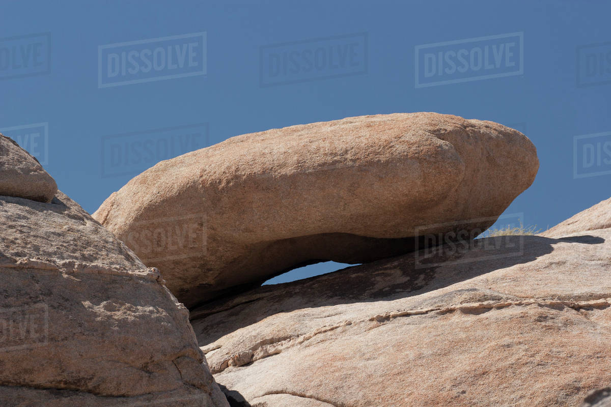 Rounded Rock On Top Of Desert Rock With Blue Sky; Palm Springs ...