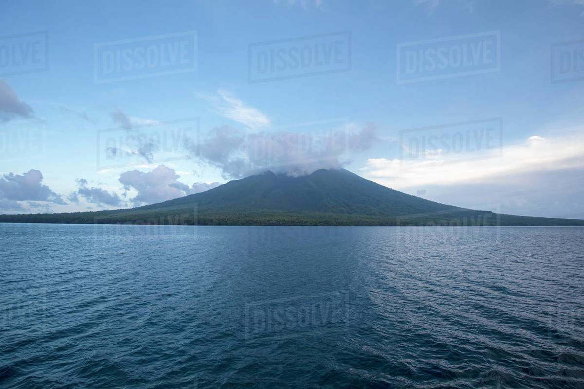 Manam Volcano with plumes of steam, on Manam Island in the Bismarck Sea ...