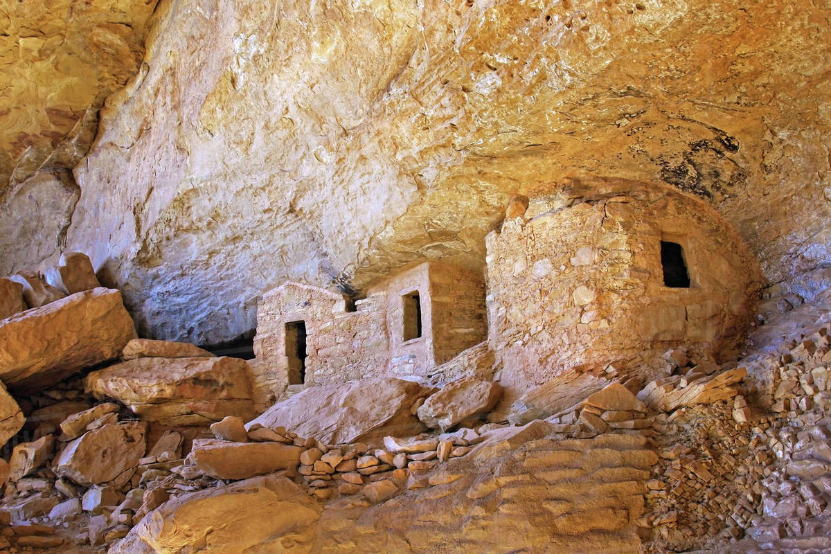 Ancient Pueblos cliff dwellings, stone structures carved into the ...
