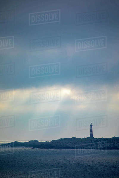 Hellisoy Lighthouse, a remote lighthouse on an island in the Western ...