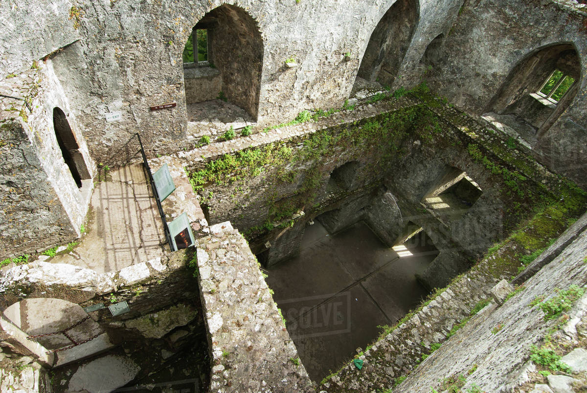 High Angle View Of Historic Stone Buildings Covered In Moss; Ireland ...