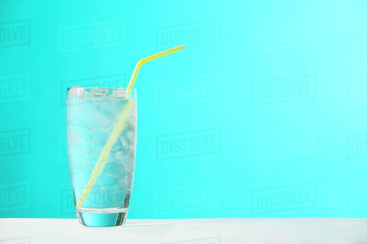 Very Full Glass Of Water With Ice And Yellow Drinking Straw - Royalty ...