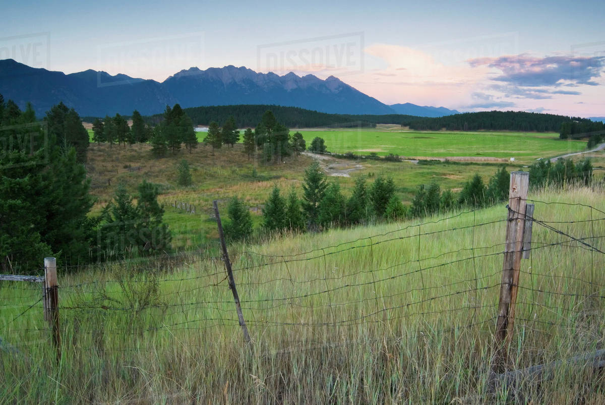 Rural Farmland And Rocky Mountains, Cranbrook, Bc, Canada - Royalty ...