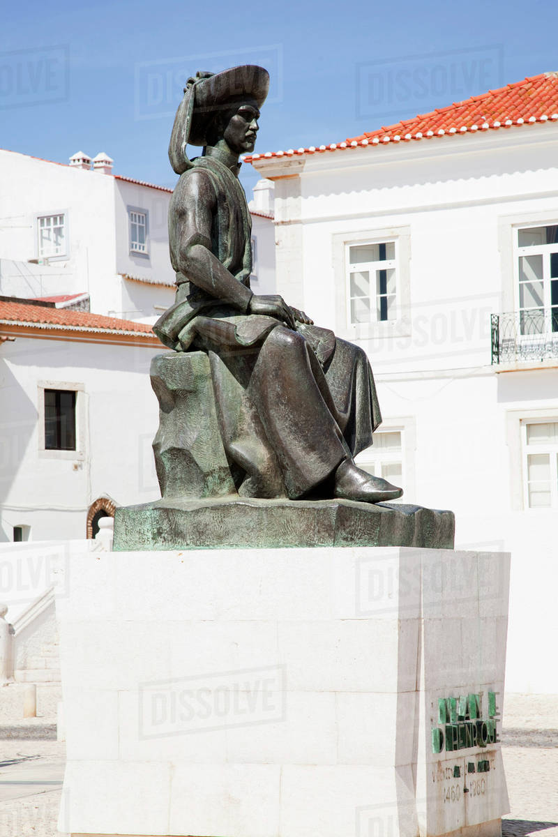 Statue Of A Man Seated On A Stone; Lagos Algarve, Portugal - Royalty ...