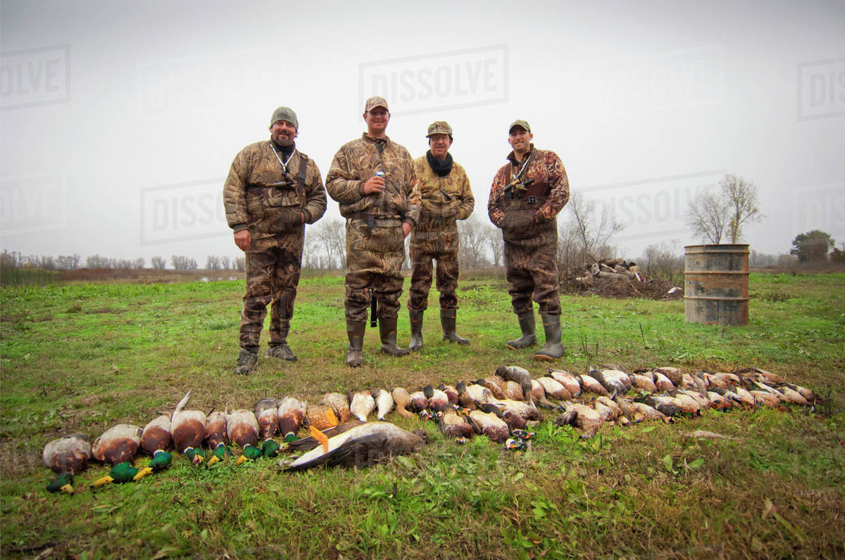 4 Men In Hunting Gear With A Row Of Dead Ducks; Colusa, California ...