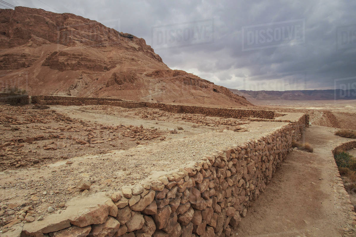 A stone wall in a roman camp;Masada southern district israel - Royalty ...