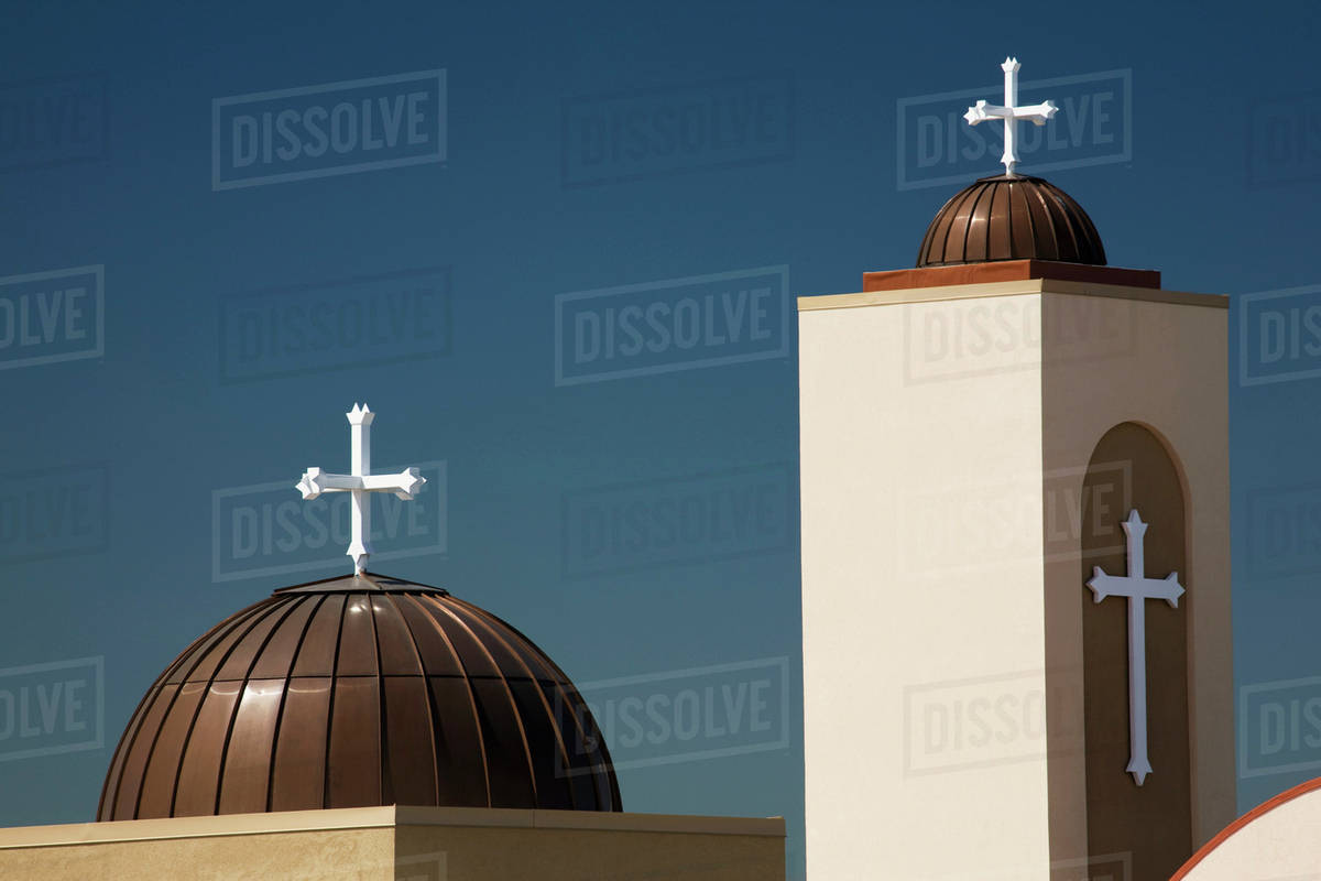 A coptic orthodox church tower and dome with blue sky;Alberta canada ...