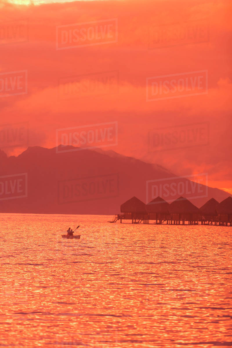 Sunset over moorea from sofitel maeva beach resort near papeete;Tahiti ...
