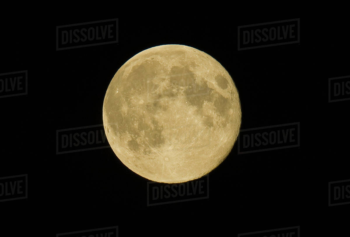 Details on the surface of a full moon in a dark sky;Anchorage alaska ...