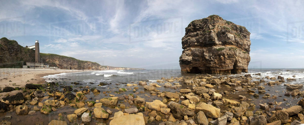 Large rock formation along the coastline at low tide;South shields tyne ...
