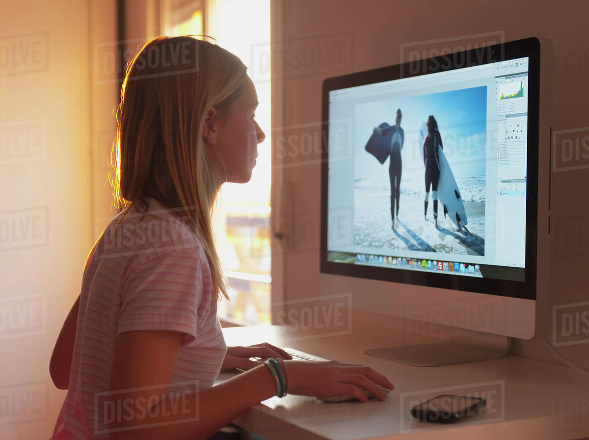 Girl Staring At Her Computer Monitor - Royalty-free Stock Photo | Dissolve