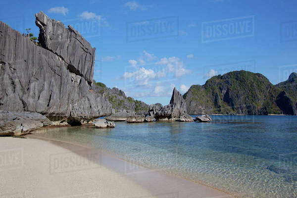 Limestone Rock Formations By Beach; Tapiutan Island, Palawan ...