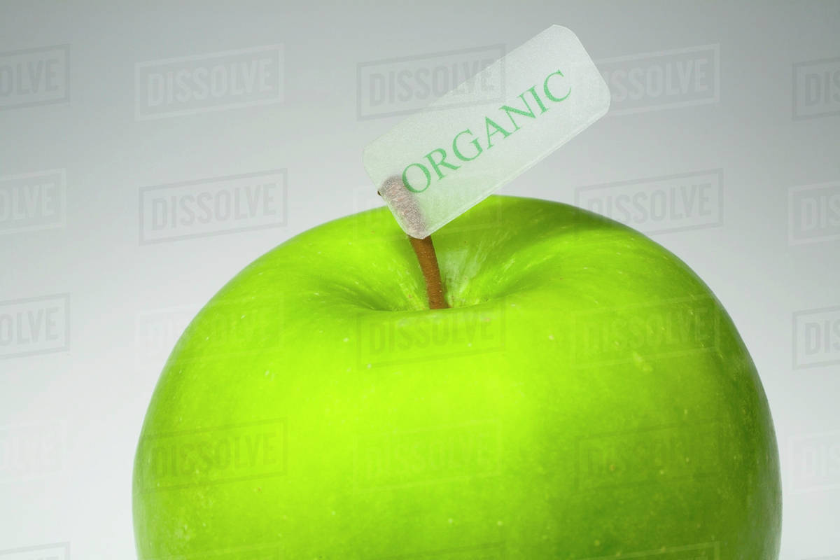 A Granny Smith Apple With An Organic Label On The Stem; Waterloo ...