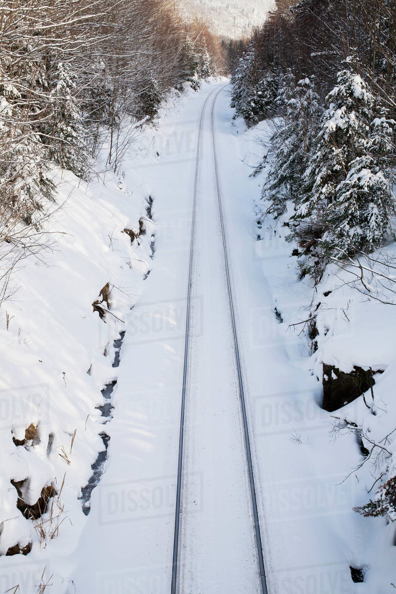 Railroad Tracks Covered In Snow In The Winter; Orford, Quebec, Canada ...