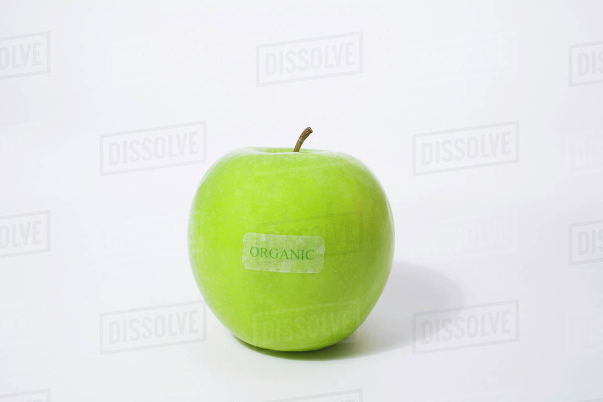 Granny Smith Apple With An Organic Label; Waterloo, Quebec, Canada ...