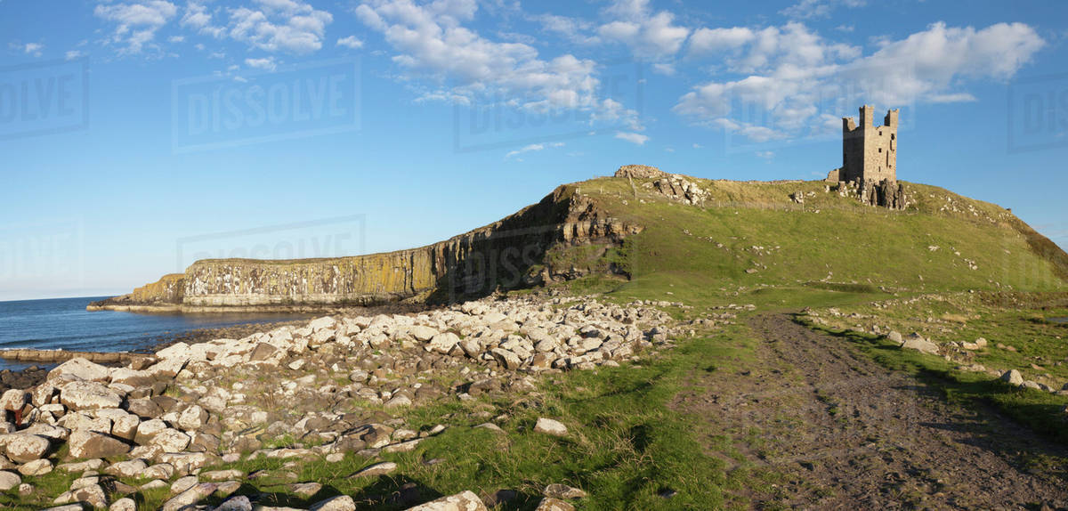 Dunstanburgh Castle; Northumberland, England - Stock Photo - Dissolve