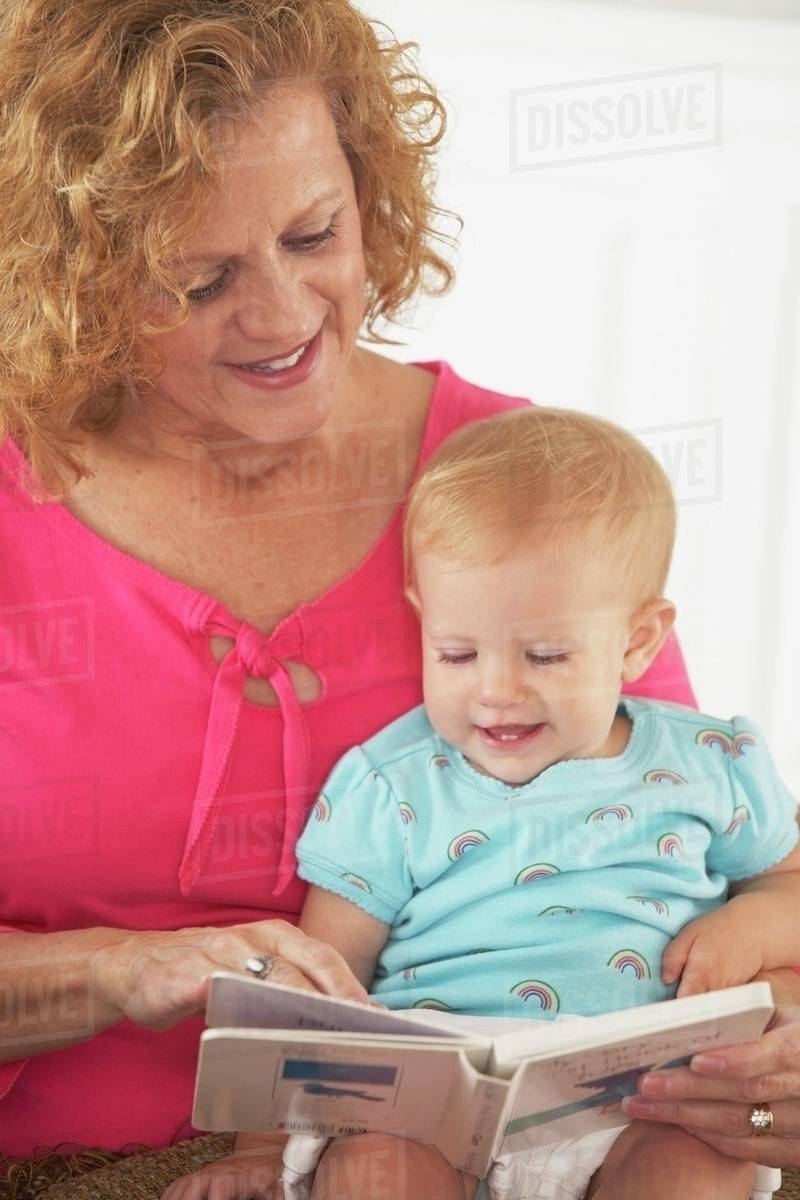 A Mother And Baby Reading A Book Together - Royalty-free Stock Photo ...