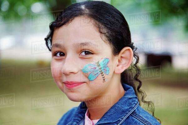 A Girl With A Butterfly Painted On Her Face - Royalty-free Stock Photo ...