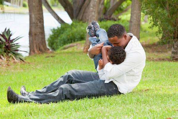 Fort Lauderdale, Florida, United States Of America; A Father Playing ...