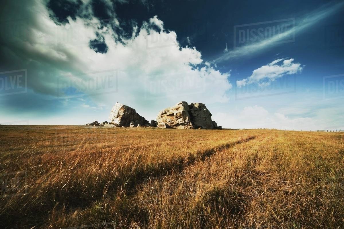 Alberta, Canada; A Large Rock On A Field - Royalty-free Stock Photo ...