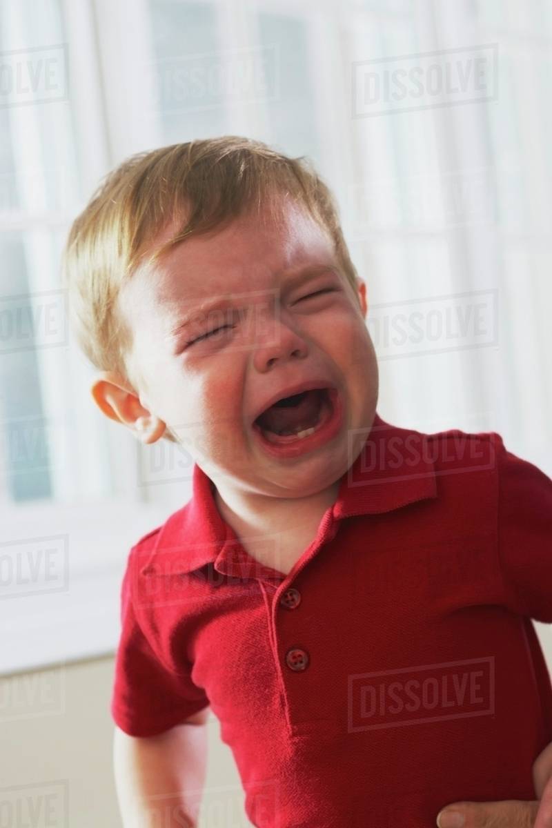 Knoxville, Tennessee, United States Of America; A Young Boy Crying ...