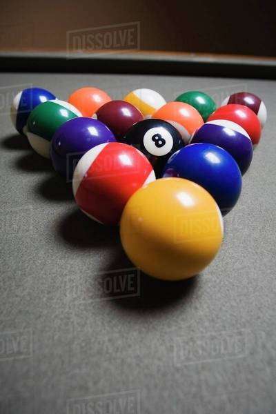 Pool Balls On A Billiard Table With The Eight Ball Facing Upwards ...