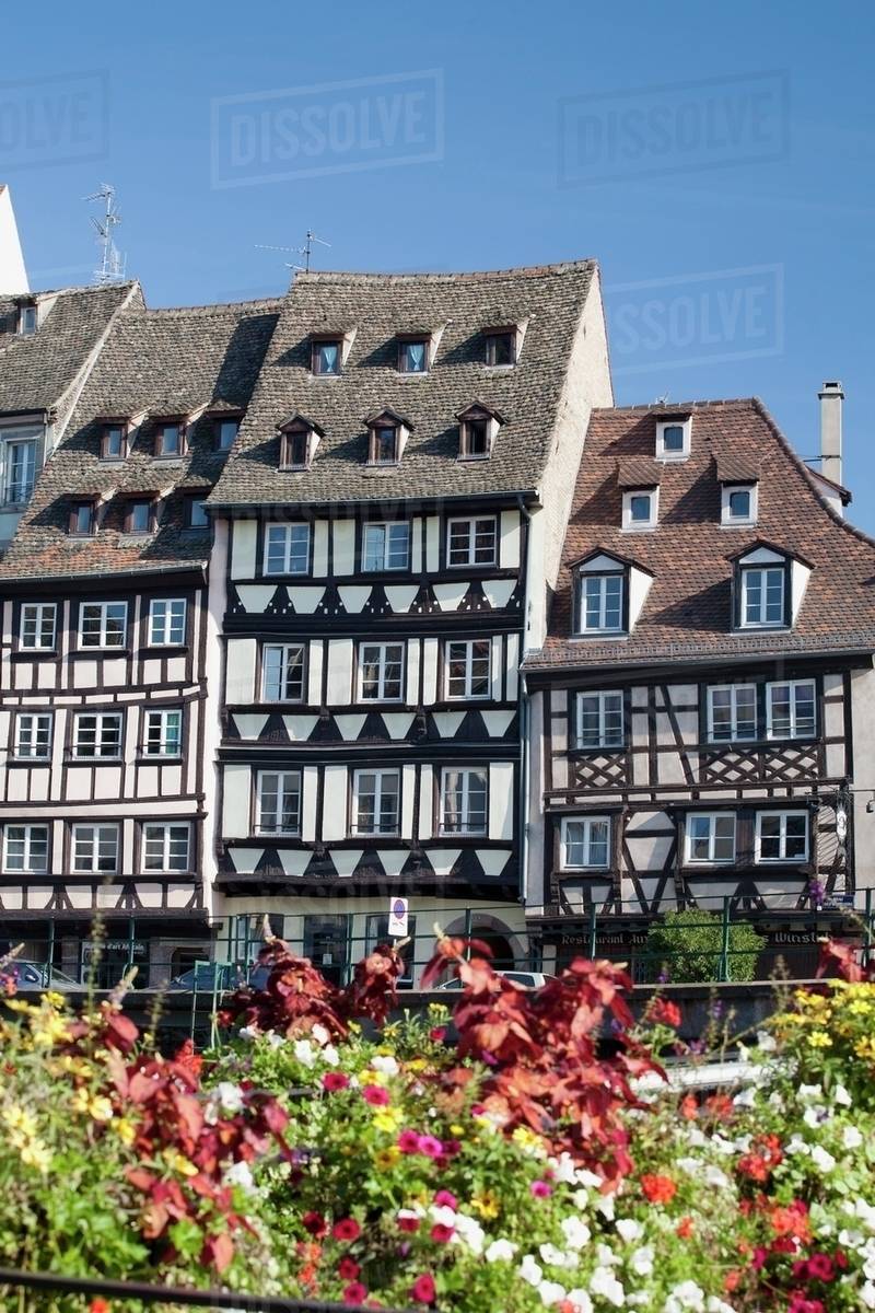Medieval Timber Style Buildings With Flowers In The Foreground ...