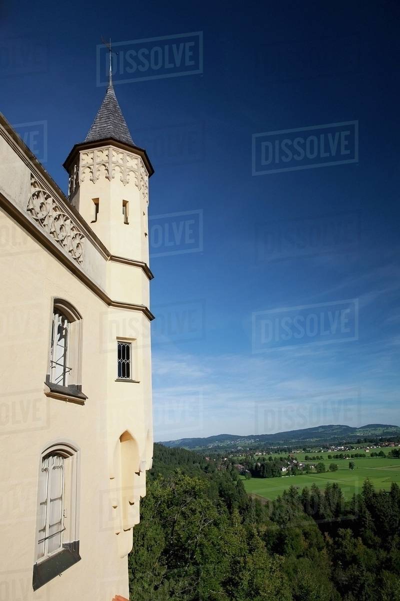 Side Wall And Turret Of A Bavarian Castle On A Mountain Side With ...