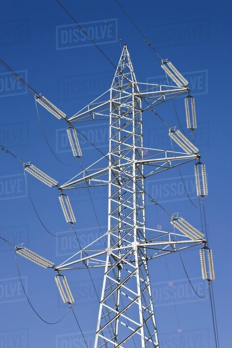 Electricity Pylons And Power Lines - Stock Photo - Dissolve